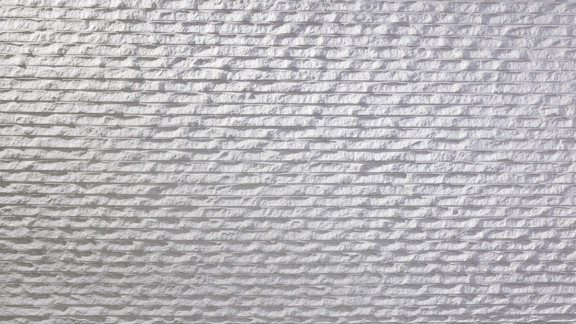 Angtai White Axe-Chiselled Stone - Flexible Tile